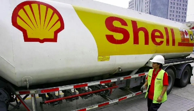 Shell reports lower profits as energy prices cool | Business
